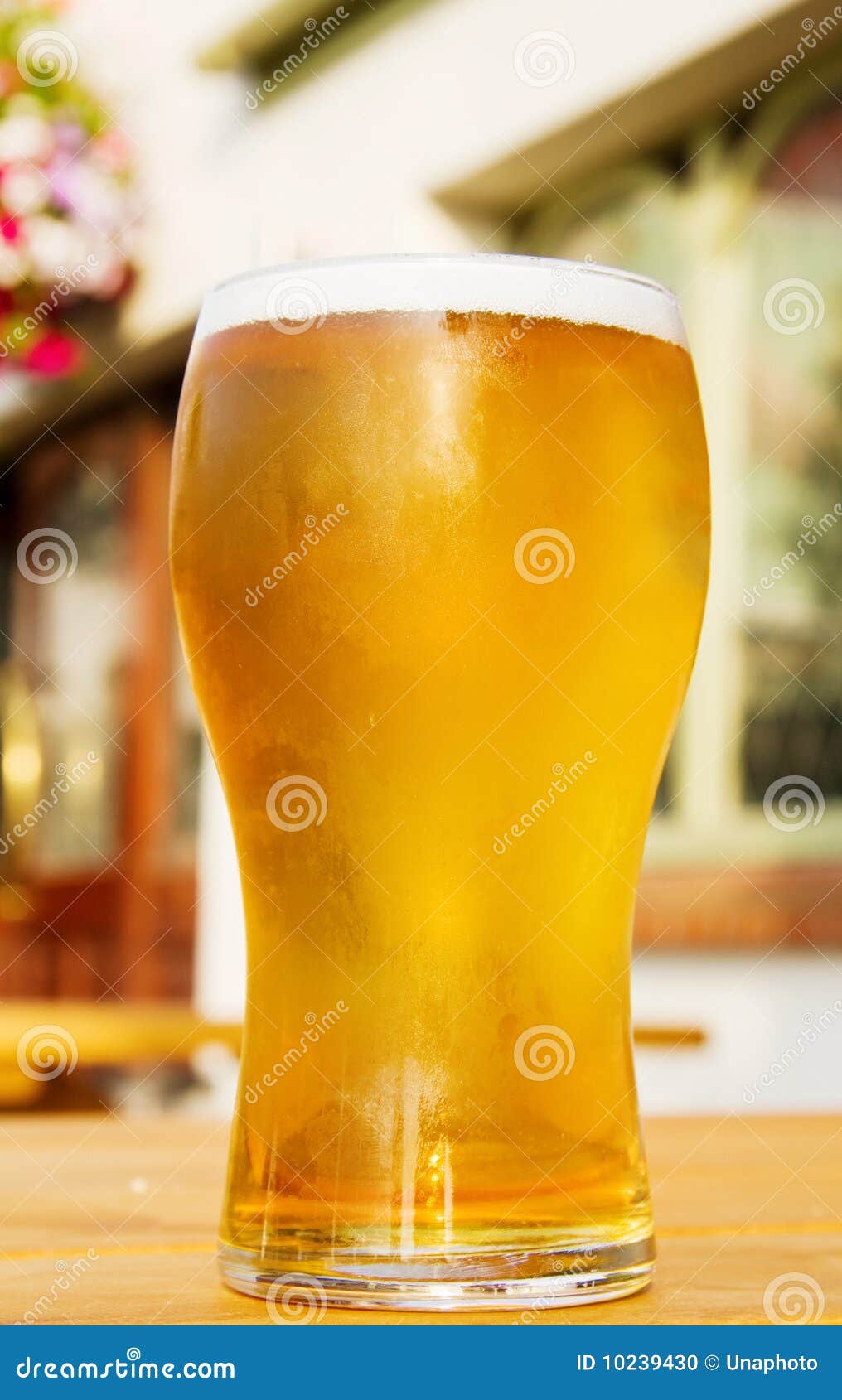 Pint of Golden Beer at the Pub Stock Photo - Image of alcohol, amber ...