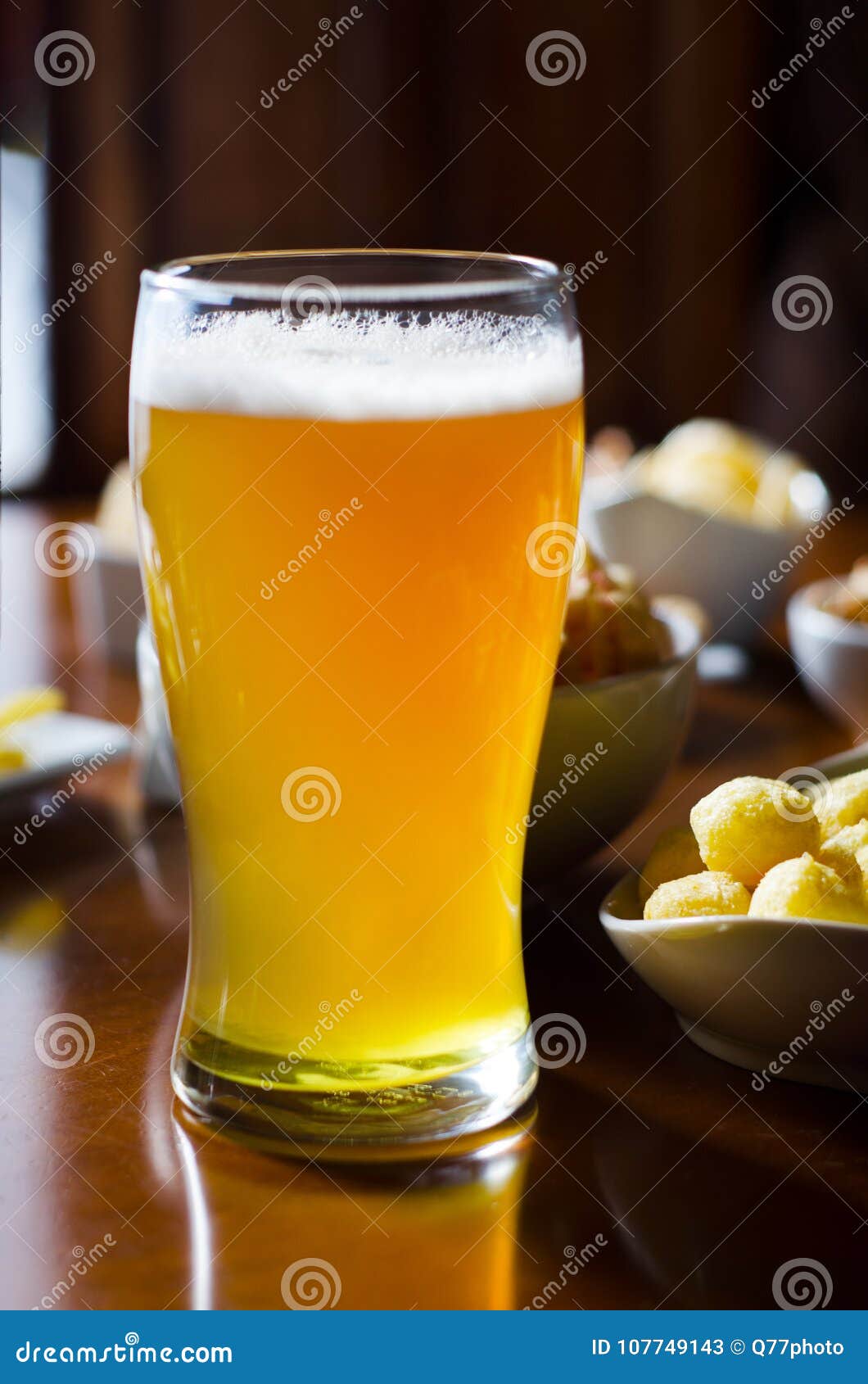 Pint of Lager Beer in a Glass, Set of Various Snacks, a Standard Stock ...