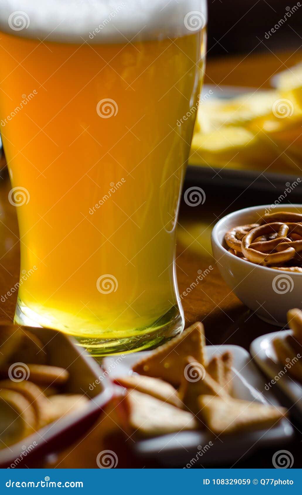 Pint of Lager Beer in a Glass, Set of Various Snacks, a Standard Stock ...