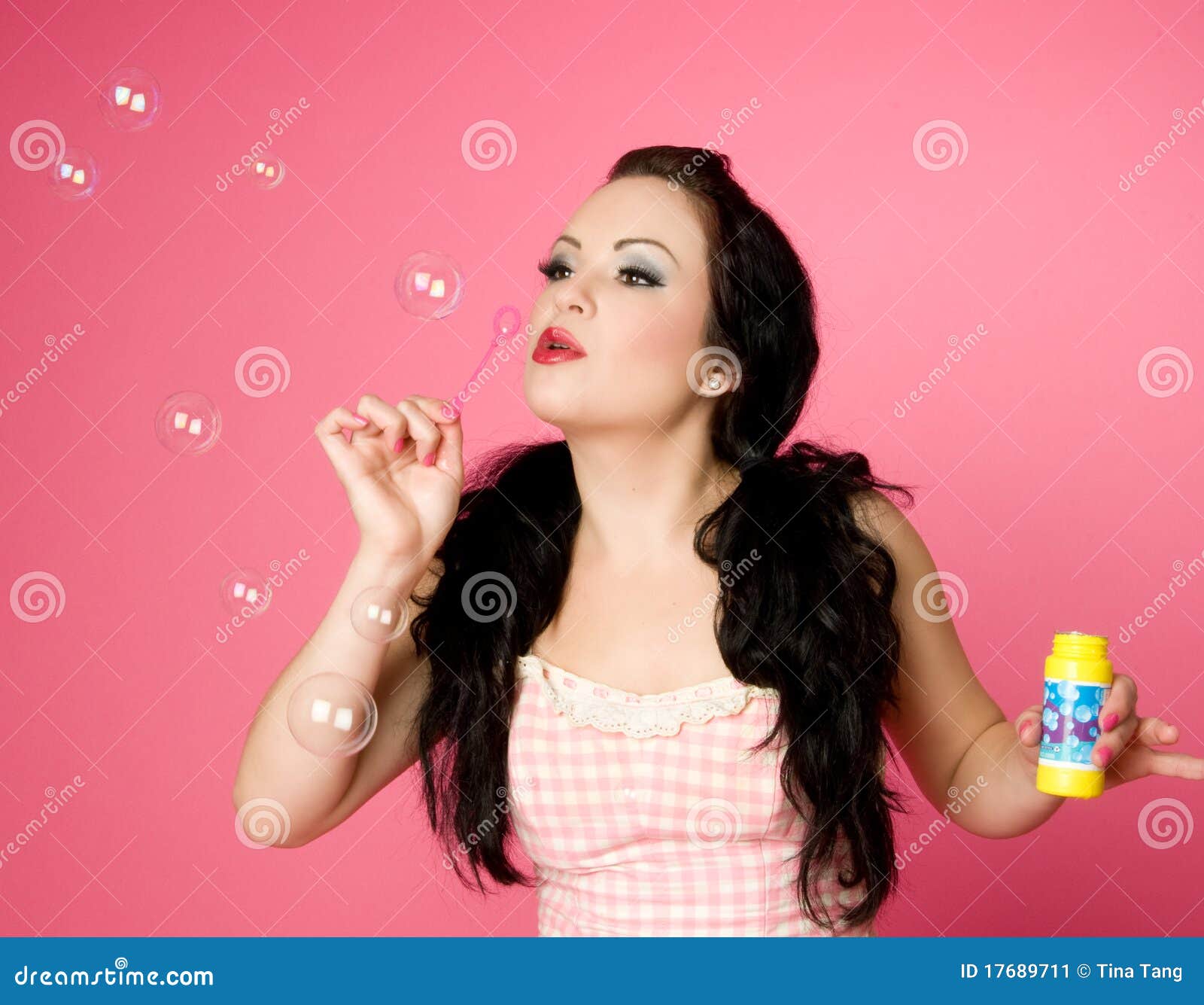 Pinup Model Blowing Soap Bubbles Stock Image - Image of blow, blowing ...