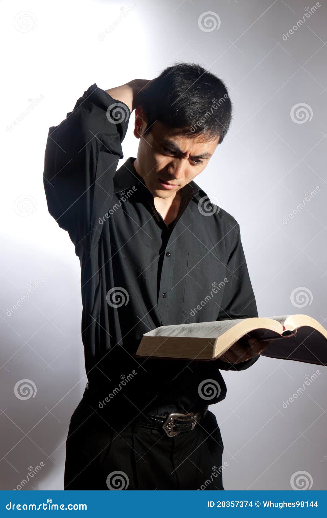 A pious Asian man stock photo. Image of bible, praying - 20357374