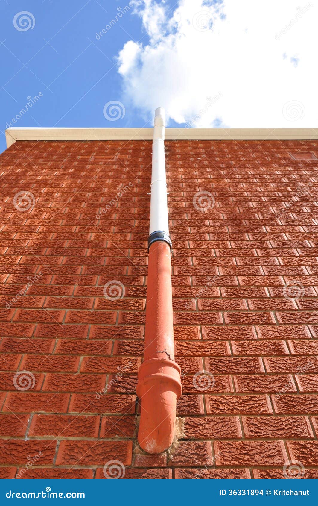 Pipe on brick wall stock photo. Image of wall, angle - 36331894