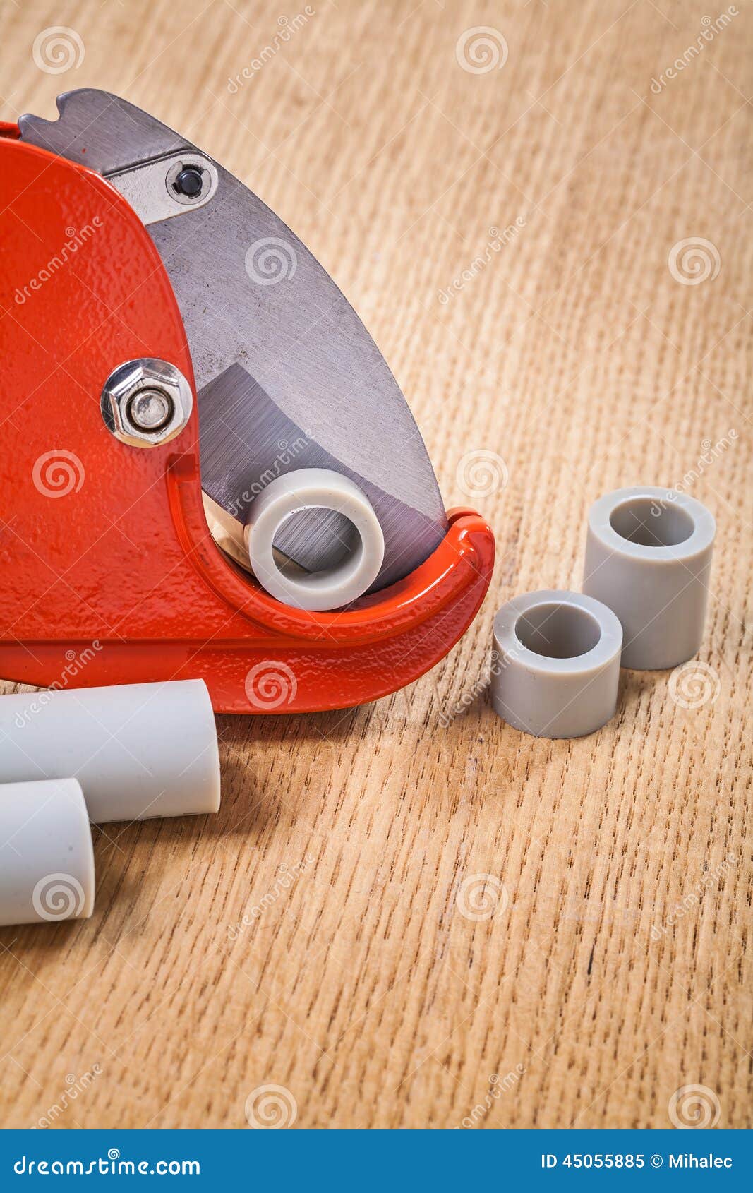 Pipe Cutter with Pipes on Woodn Board Stock Image - Image of blade ...