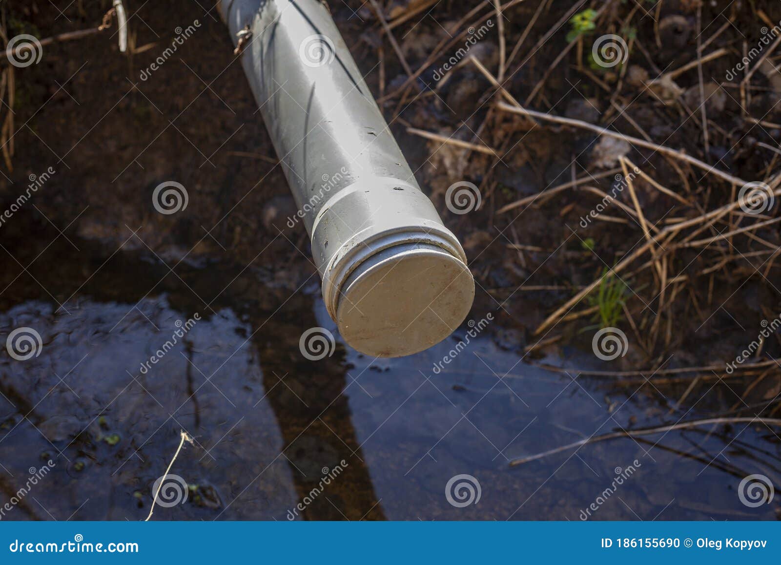 Pipe Sticks Out of the Ground Stock Photo - Image of earth ...