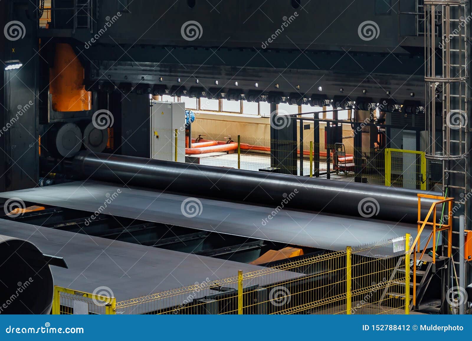 Pipe Formation by Using Roll Bending Machine, Close Up Stock Photo ...