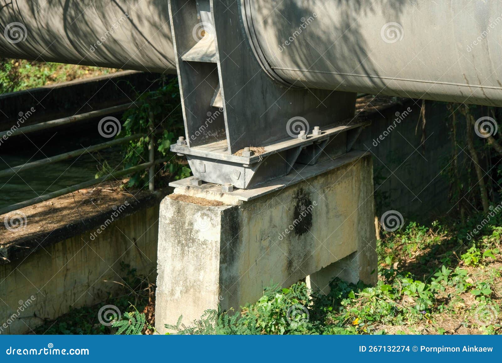 Pipe is Installed Along the Bridge on the Pipe Support. Water Steel ...