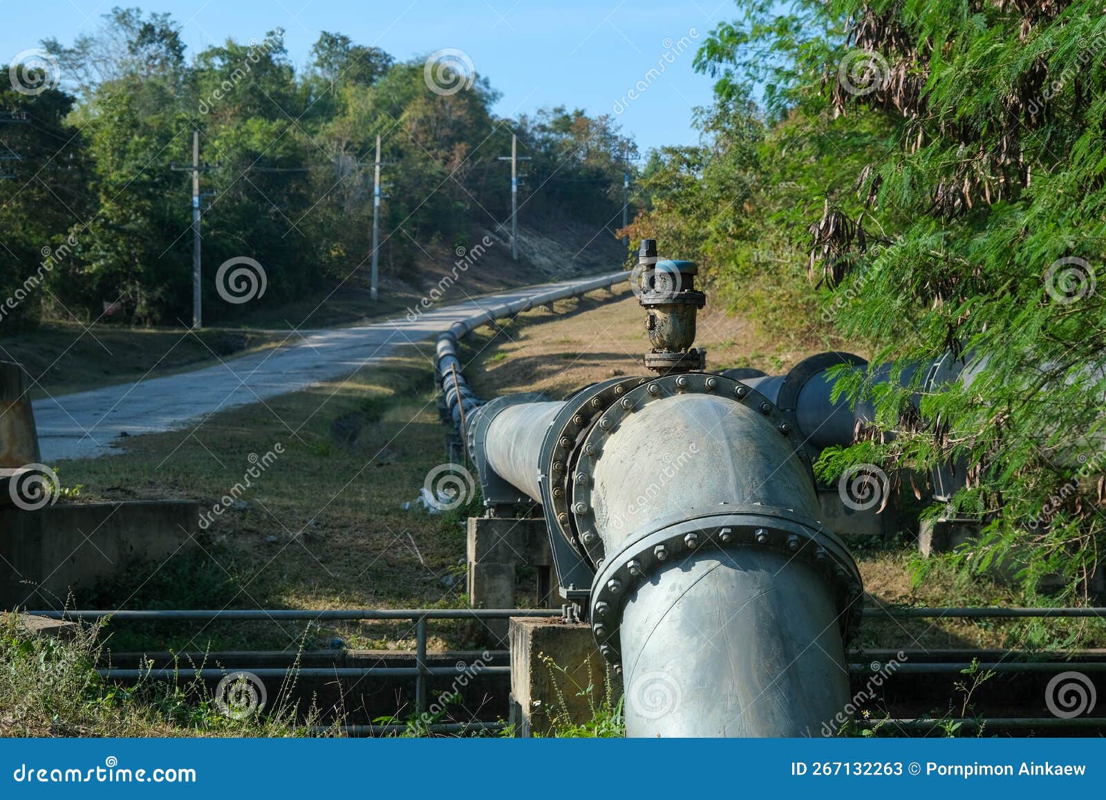 Pipe is Installed Along the Bridge on the Pipe Support. Water Steel ...