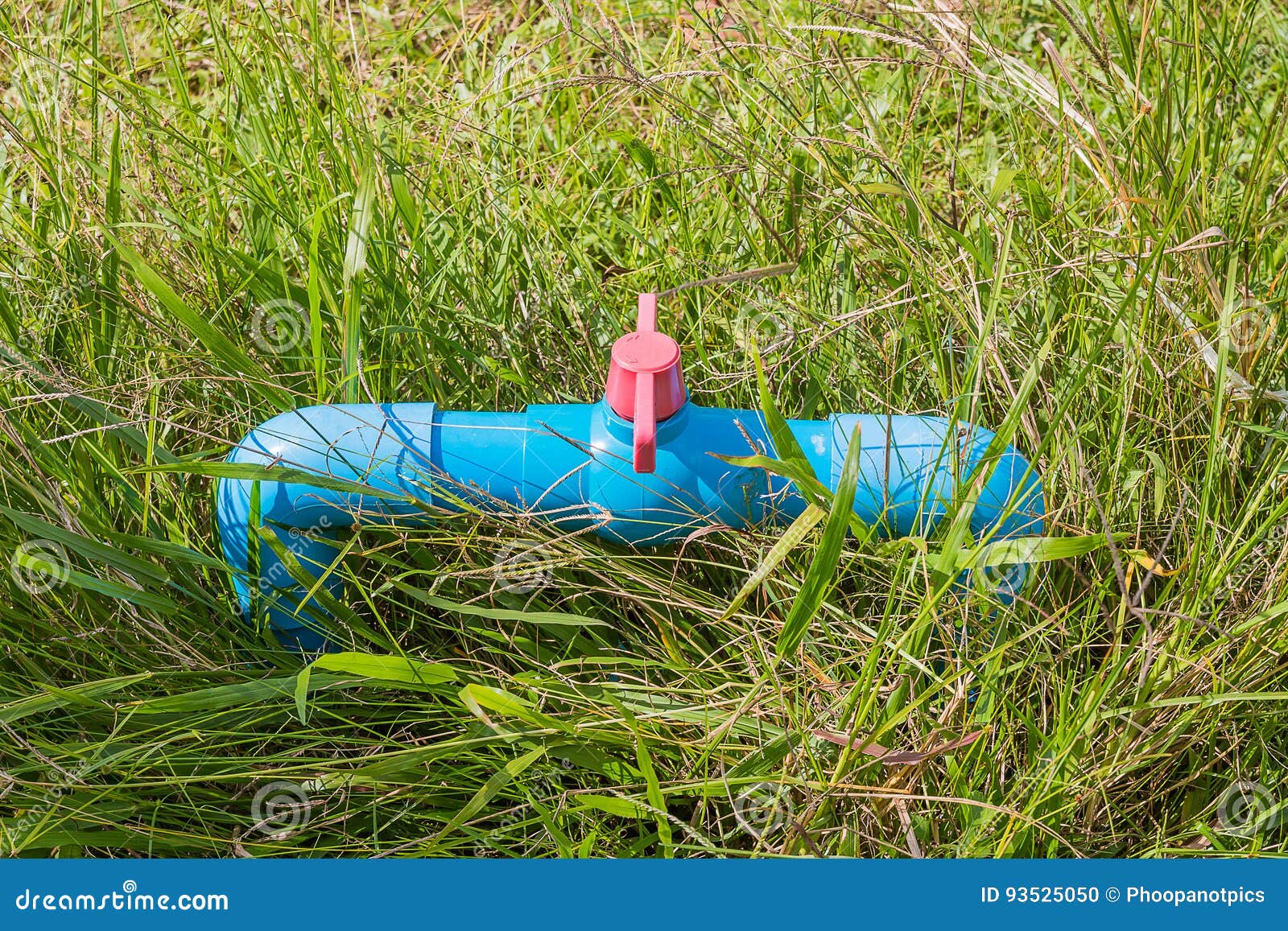 Pipe with many grass stock photo. Image of overgrown - 93525050