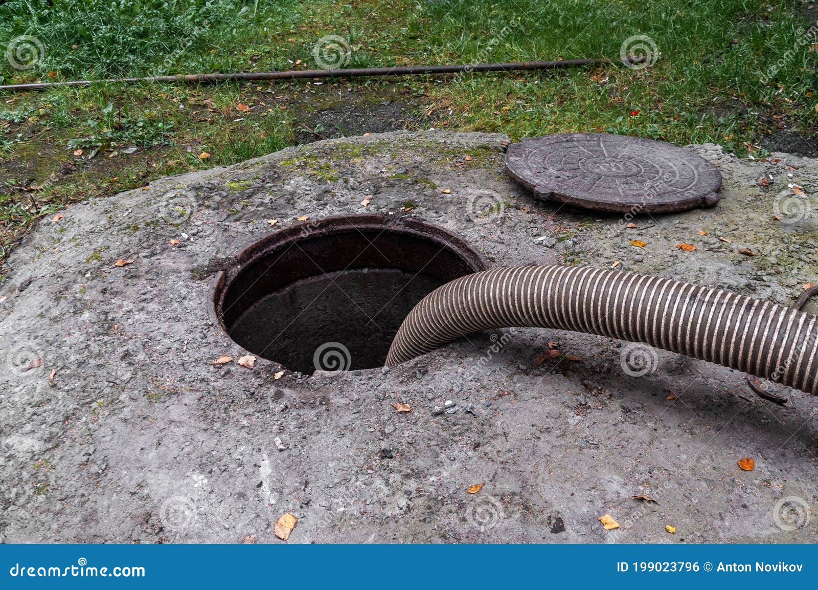 Pipe placed in a manhole stock photo. Image of district - 199023796