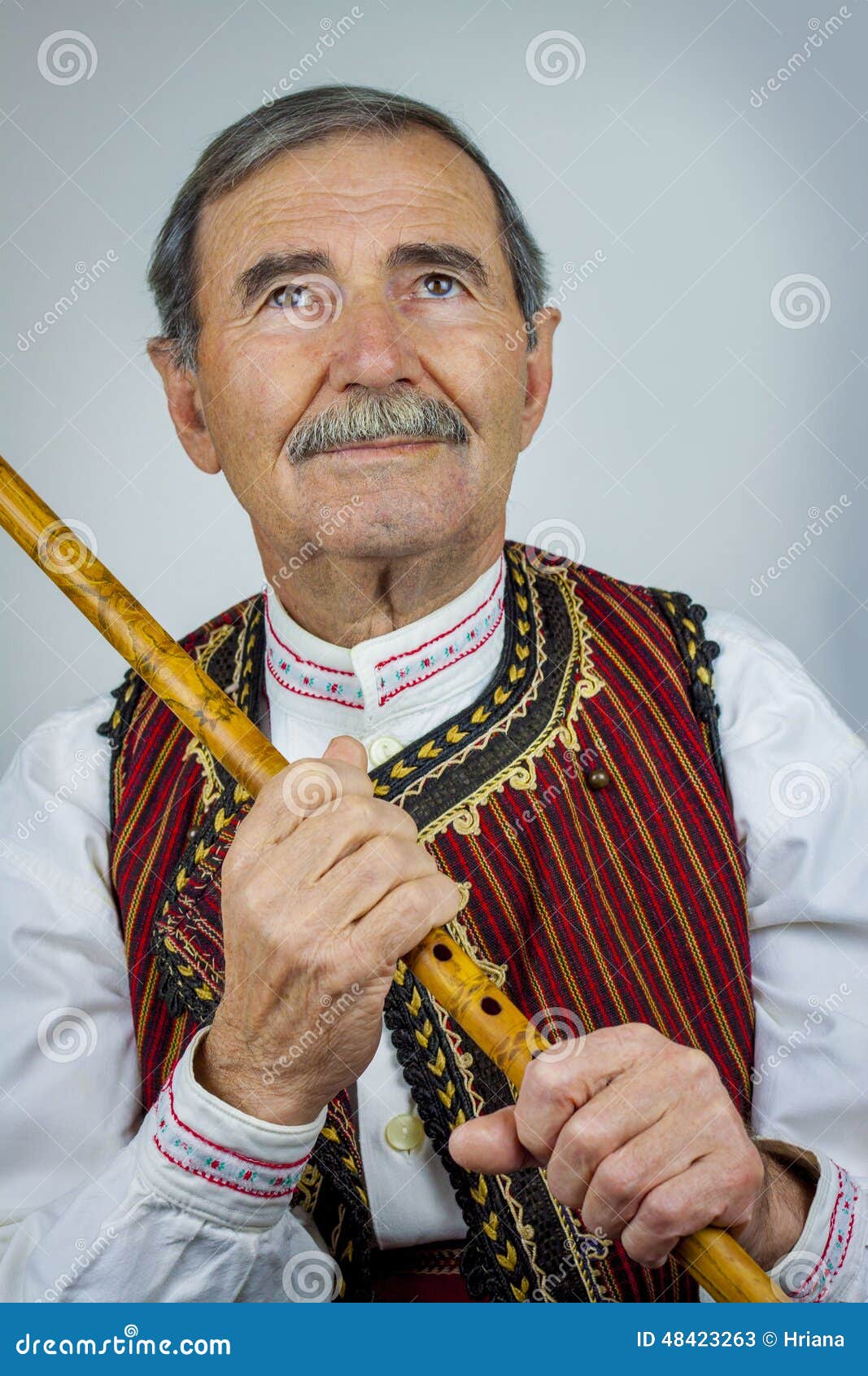 Pipe Player in Traditional Clothing Stock Image - Image of caucasian ...