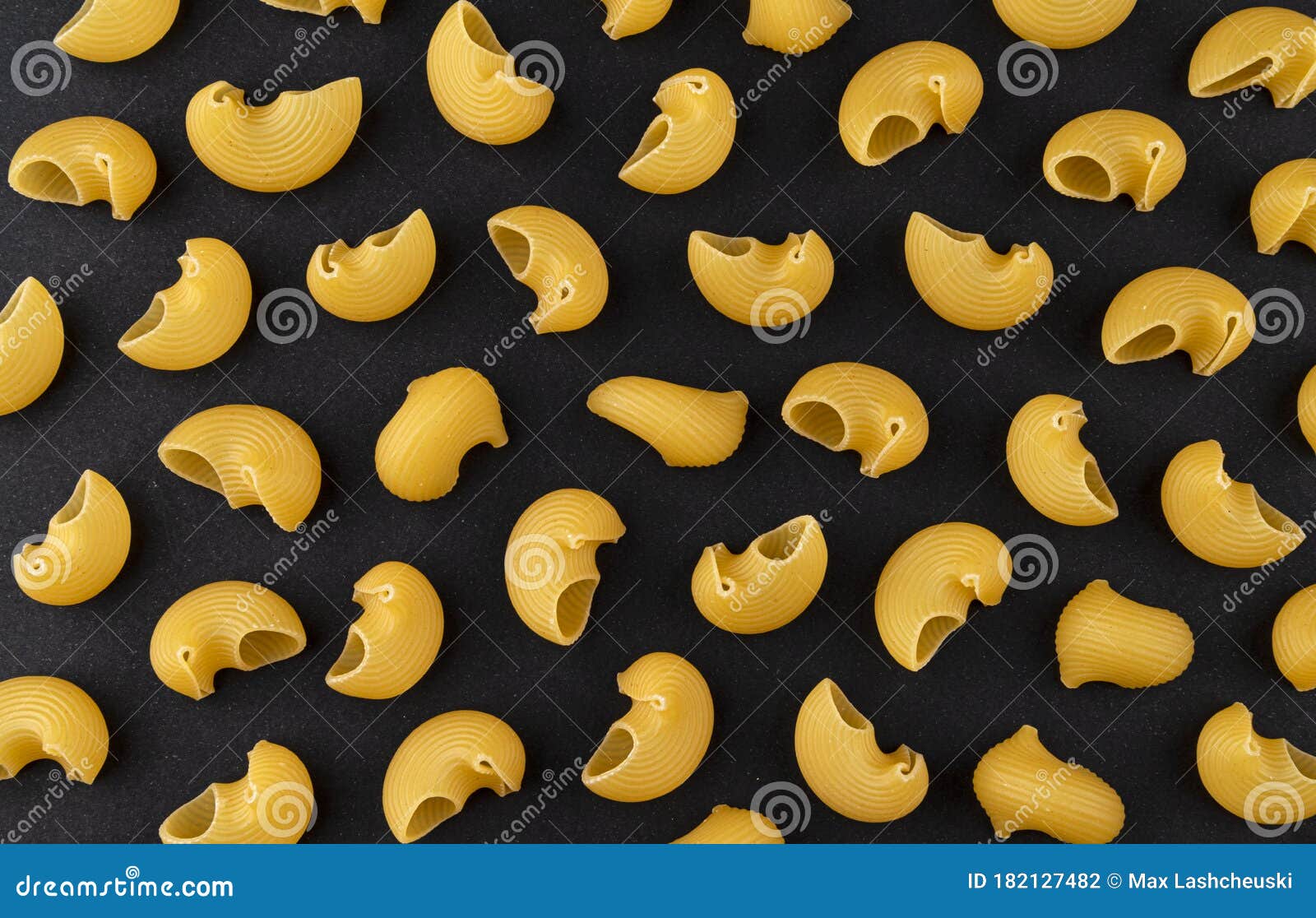 Pipe Rigate Pasta Pattern on Black Background, Top View, Flat Lay ...