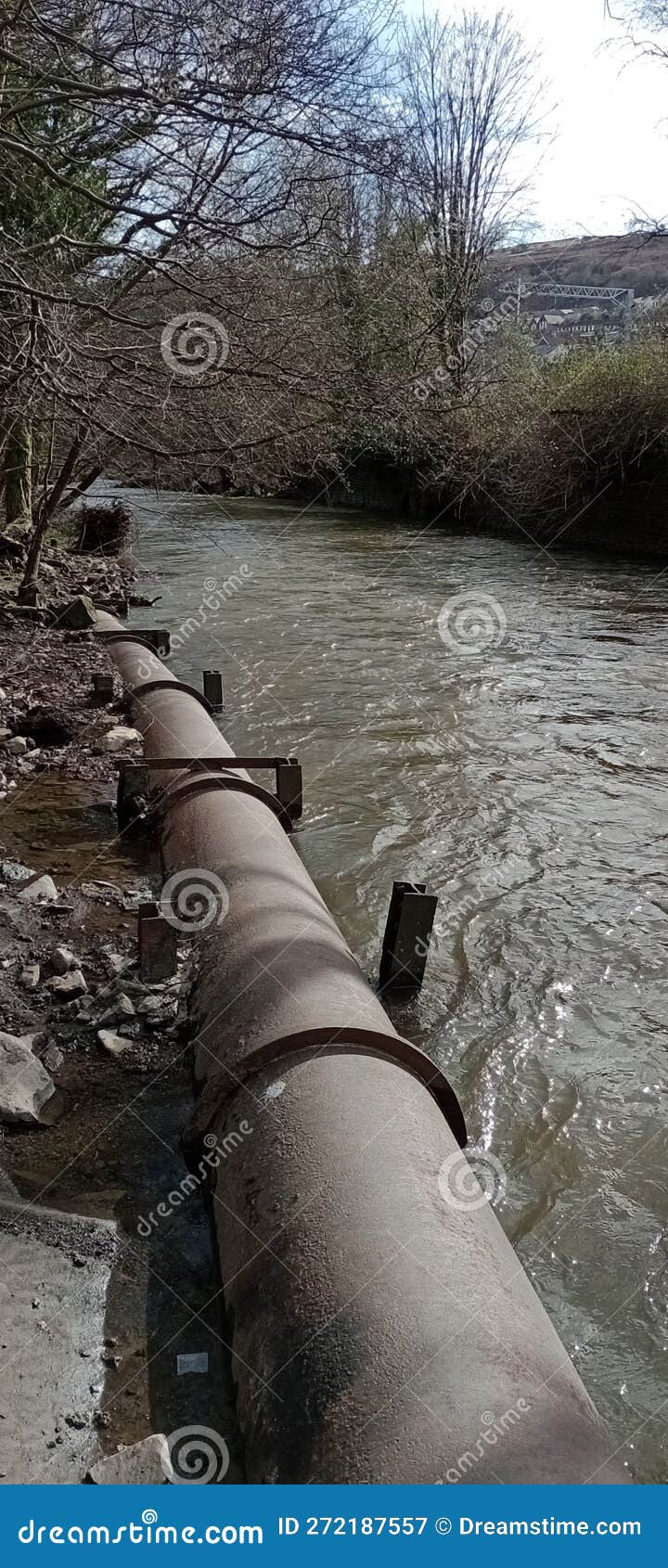 Pipeline on the Side of the River Stock Image - Image of bridbe, rock ...