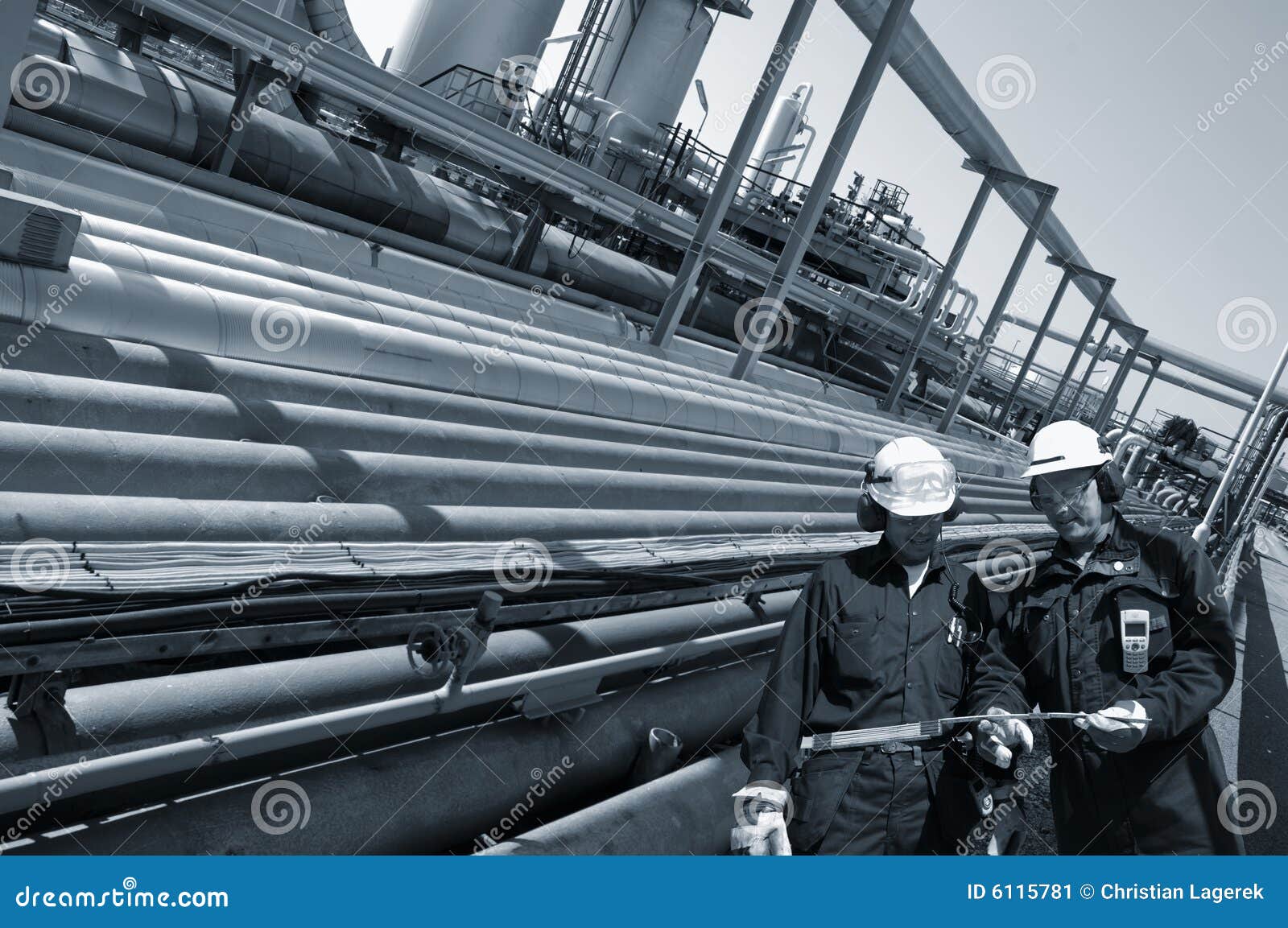 Pipelines and engineers stock image. Image of power, tanks - 6115781