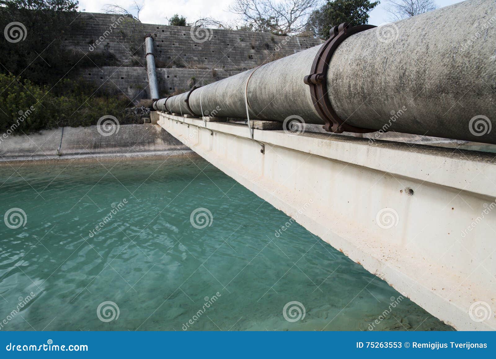 Pipes Above the Water Channel Stock Image - Image of water, industrial ...