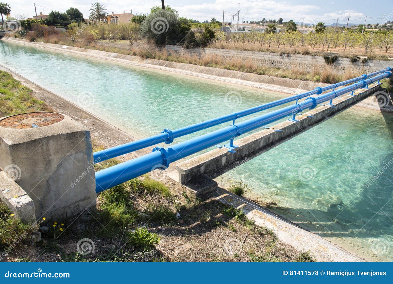 Pipes Above the Water Channel Stock Photo - Image of system, canal ...