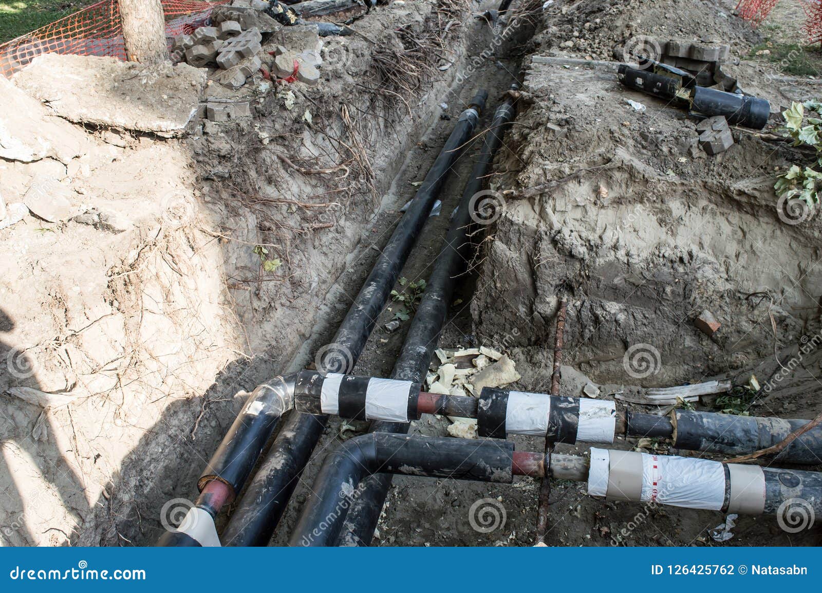 Pipes In The Earthen Trench For Heating System Stock Photography ...