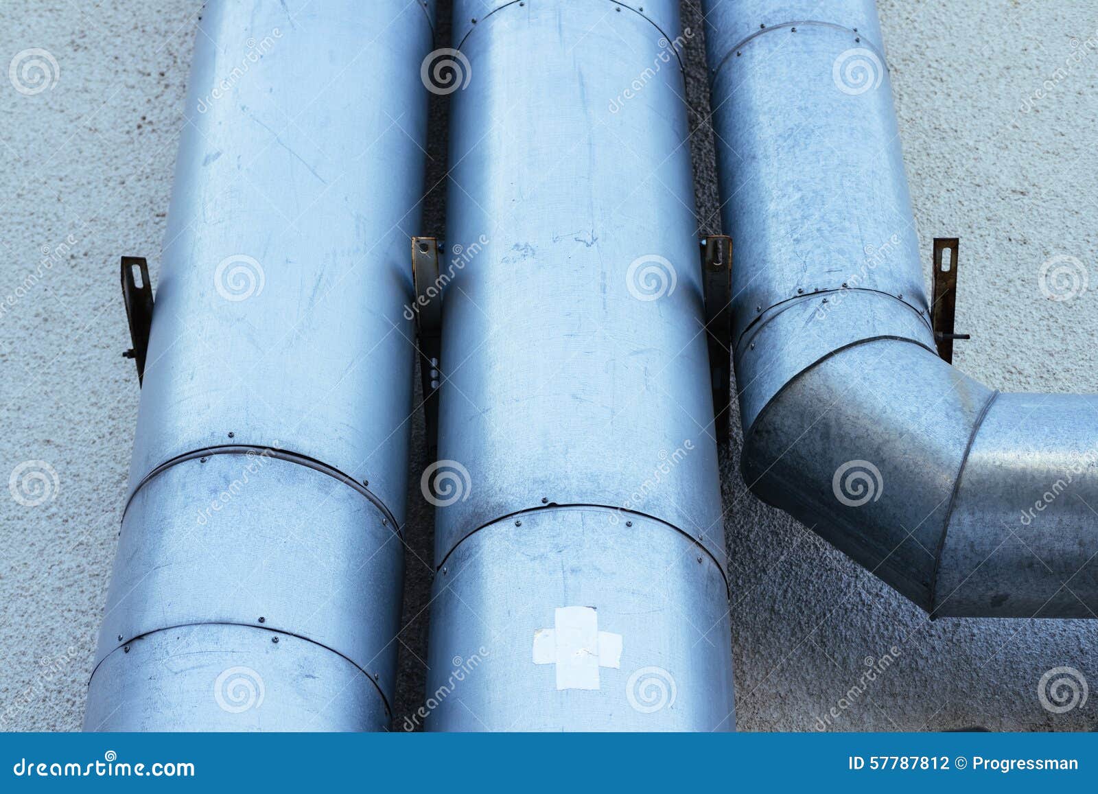 The Pipes on the Exterior Wall of a Building Close-up Stock Photo ...