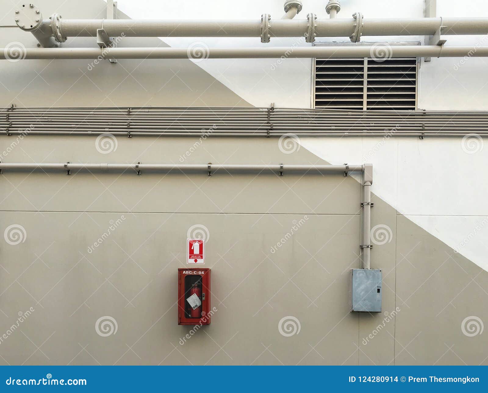 Pipes and Fire Extinguishers on the Gray Flap. Stock Photo - Image of ...