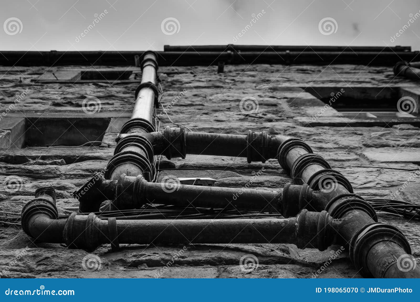 Pipes Go Up the Facade of the Building Stock Photo - Image of metal ...