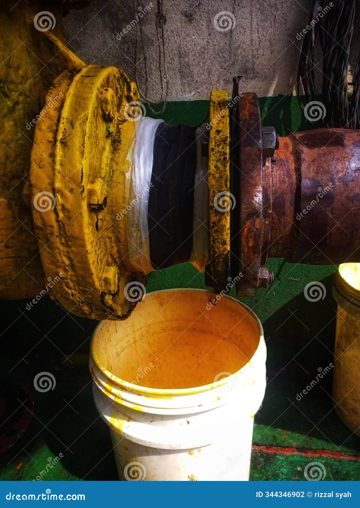 Pipes for Loading and Unloading Dripping Crude Palm Oil Covered in ...