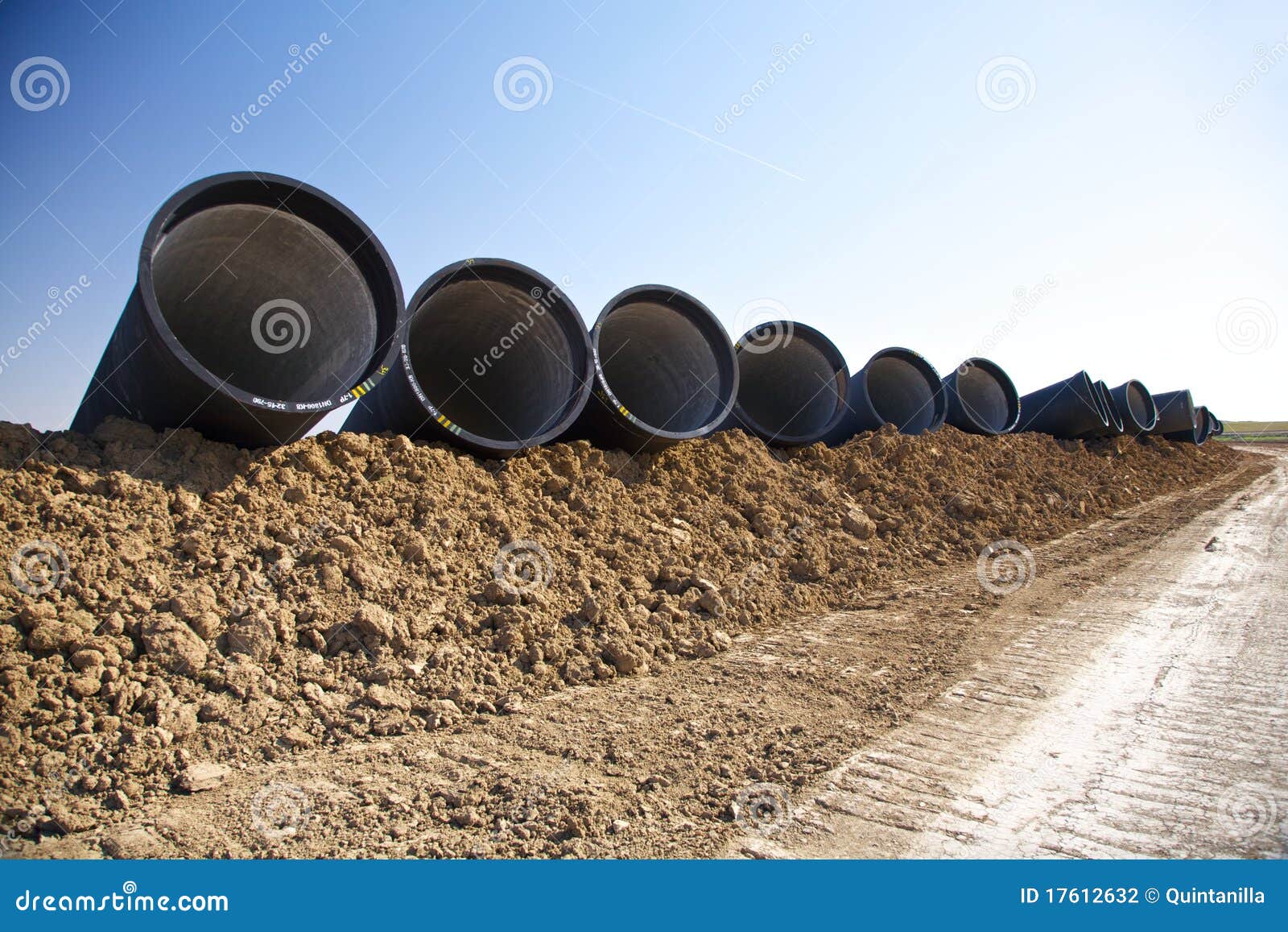 Pipes on the mud stock photo. Image of machine, blue - 17612632