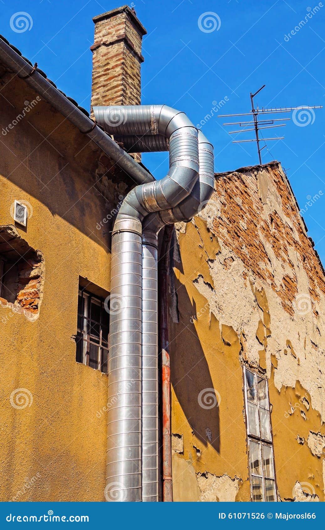 Pipes and Smoke Stack of an Old Factory Building Stock Photo - Image of ...