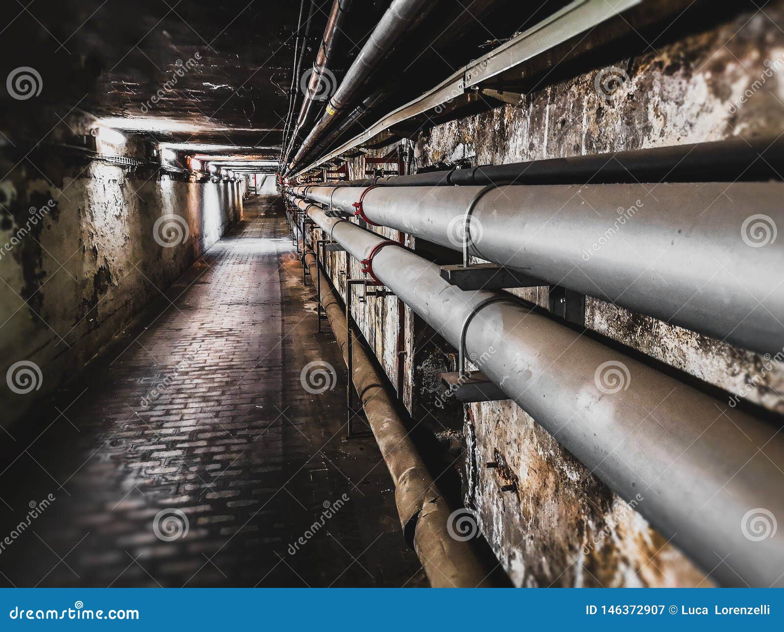Pipes on Underground Maintenance Tunnel Wall Stock Image - Image of ...