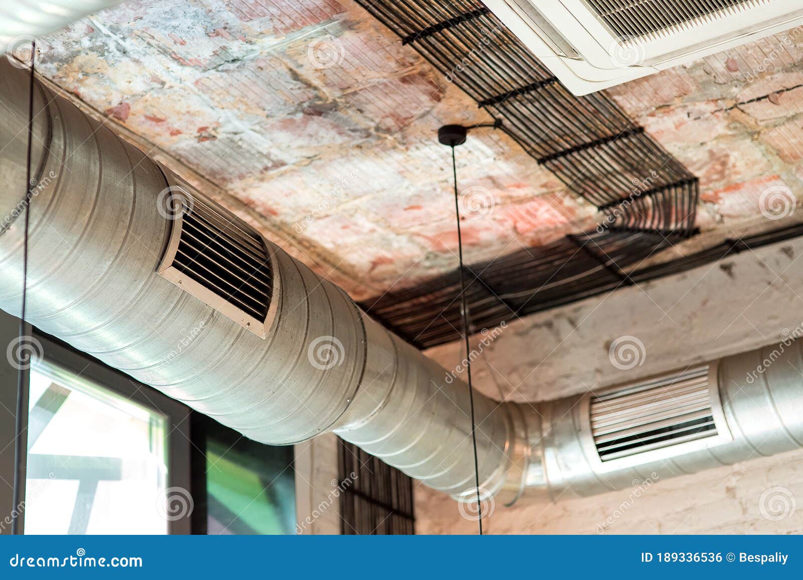 Pipes of the Ventilation System Above the Ceiling of the Loft Bar ...