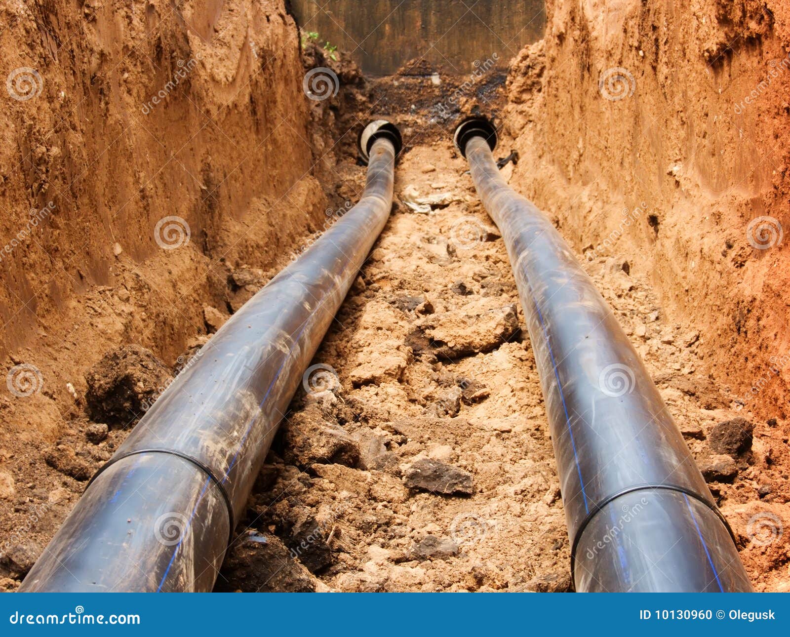 Pipes for Water in a Trench Stock Photo - Image of hole, water: 10130960
