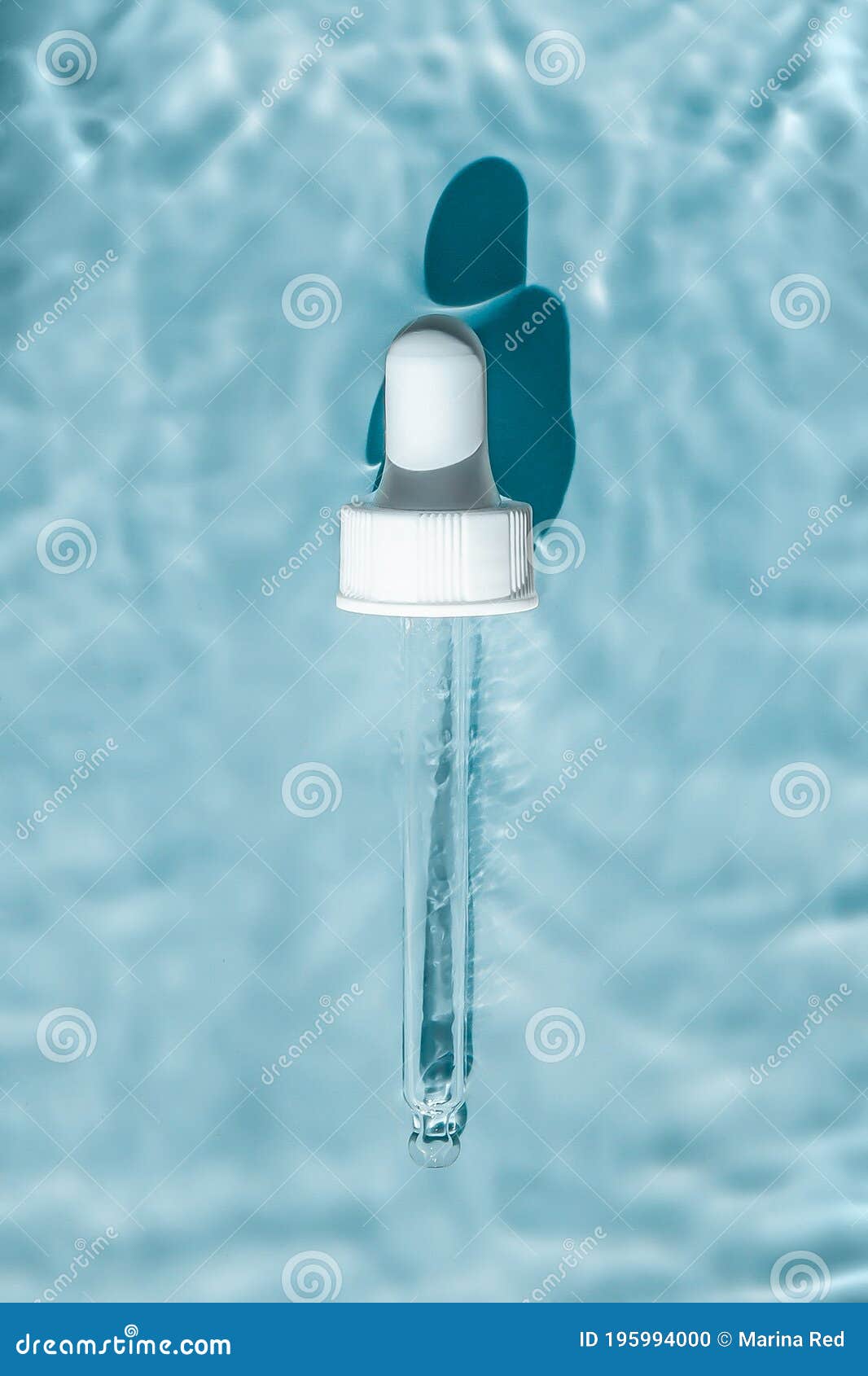 The Pipette is in the Water . Stock Photo - Image of bottle, beauty ...