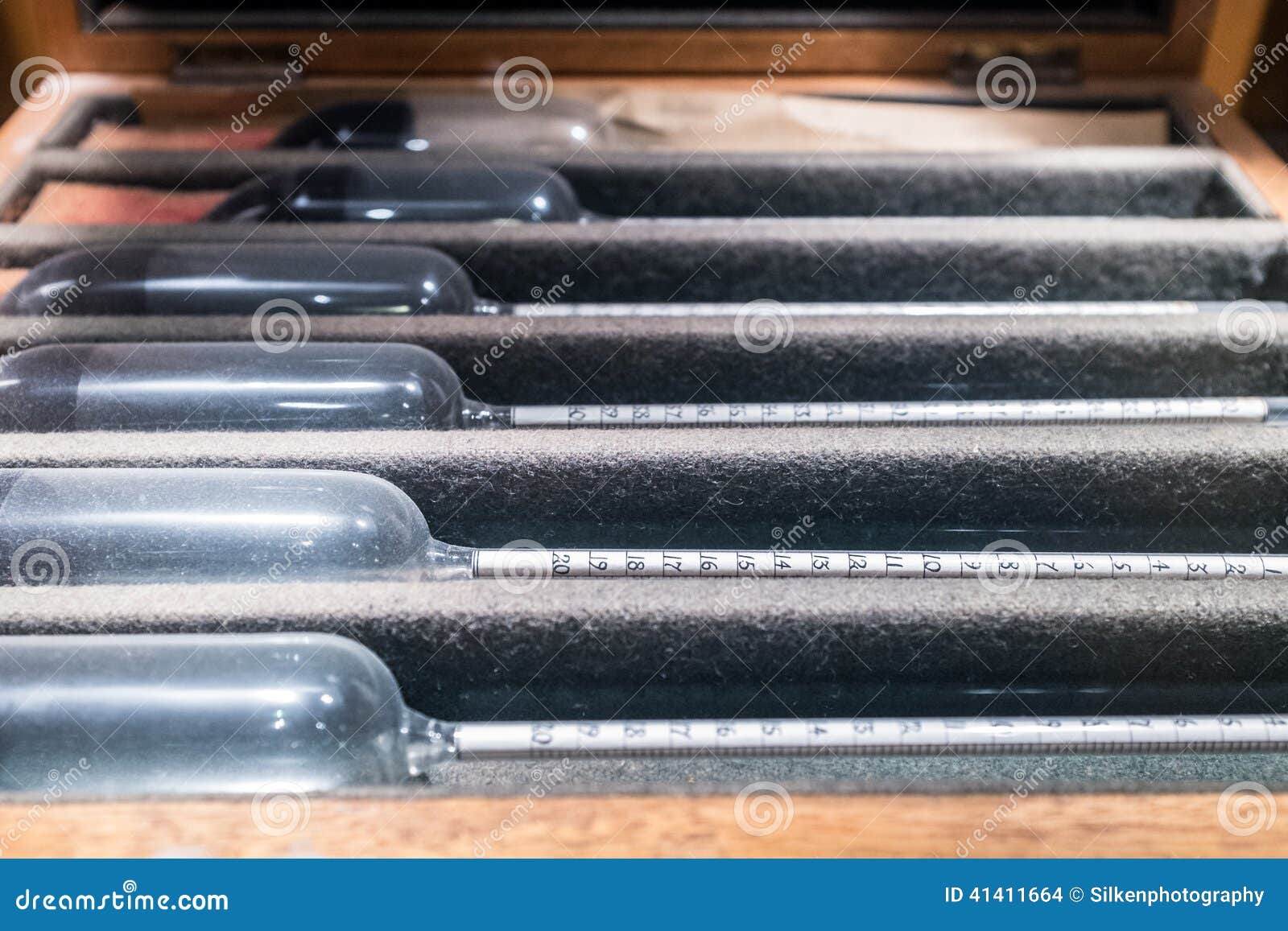 Measuring Pipettes And A Beaker On A White Table In A Cosmetic ...