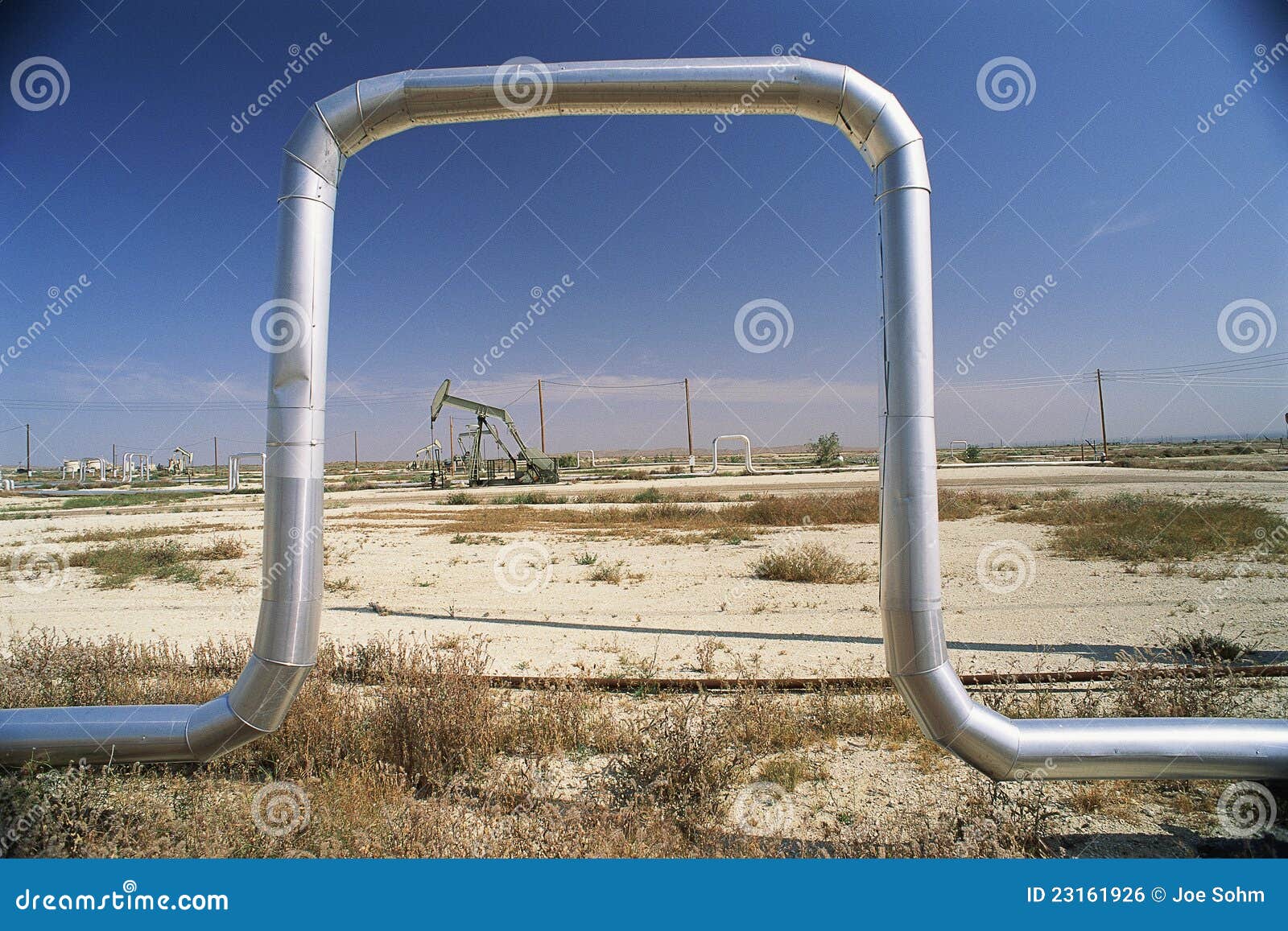 Piping at oil field stock photo. Image of curve, pipe - 23161926