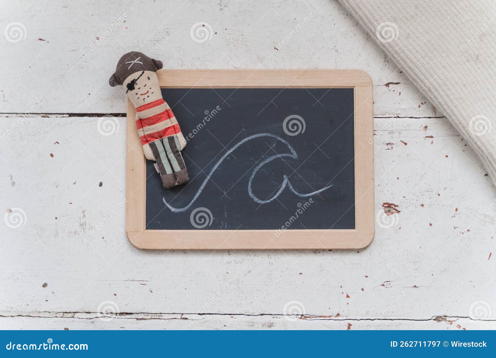 Pirate Doll with a Wave Drawn on the Chalk Board Stock Image - Image of ...