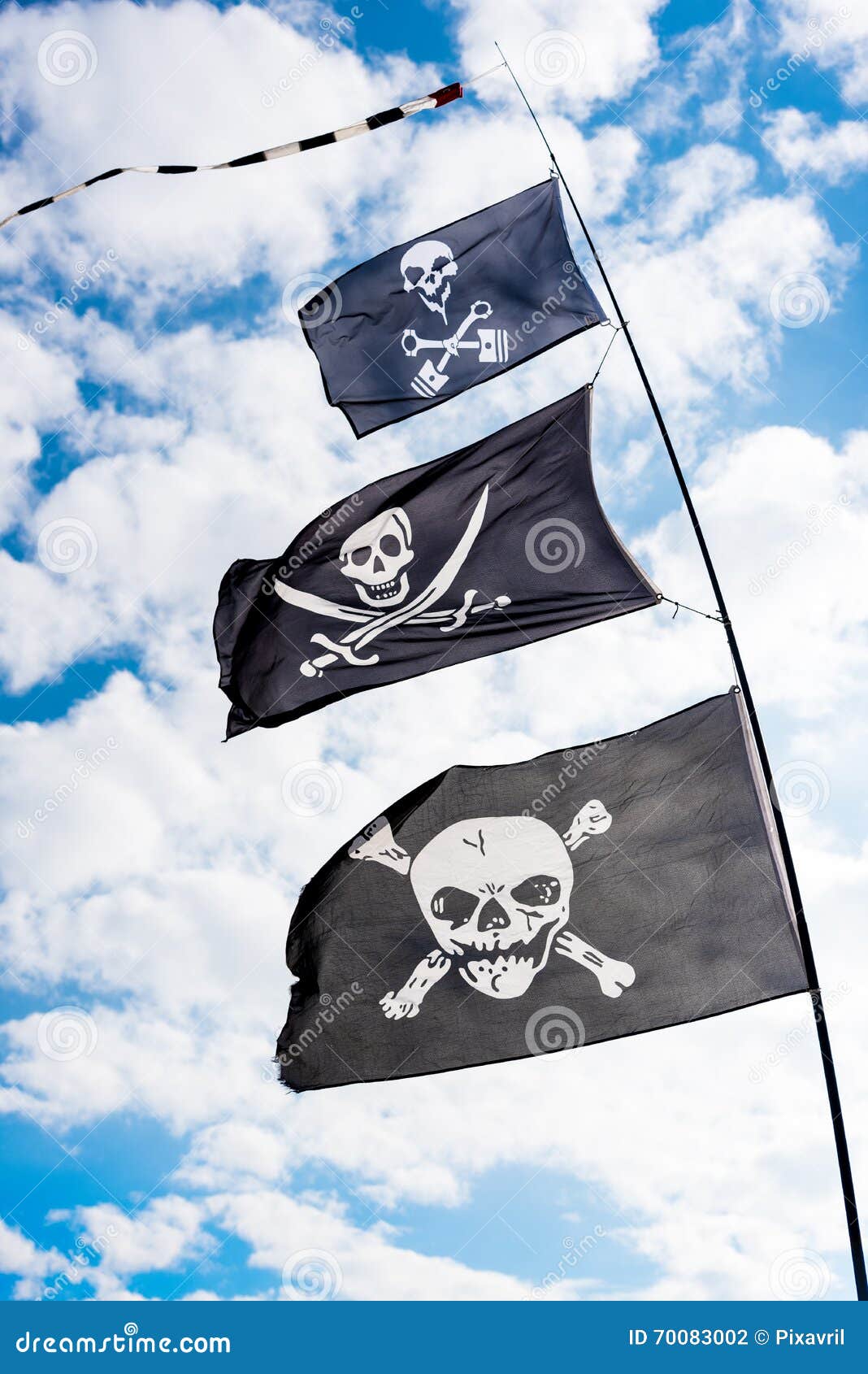 Pirate flags in the wind stock photo. Image of black - 70083002