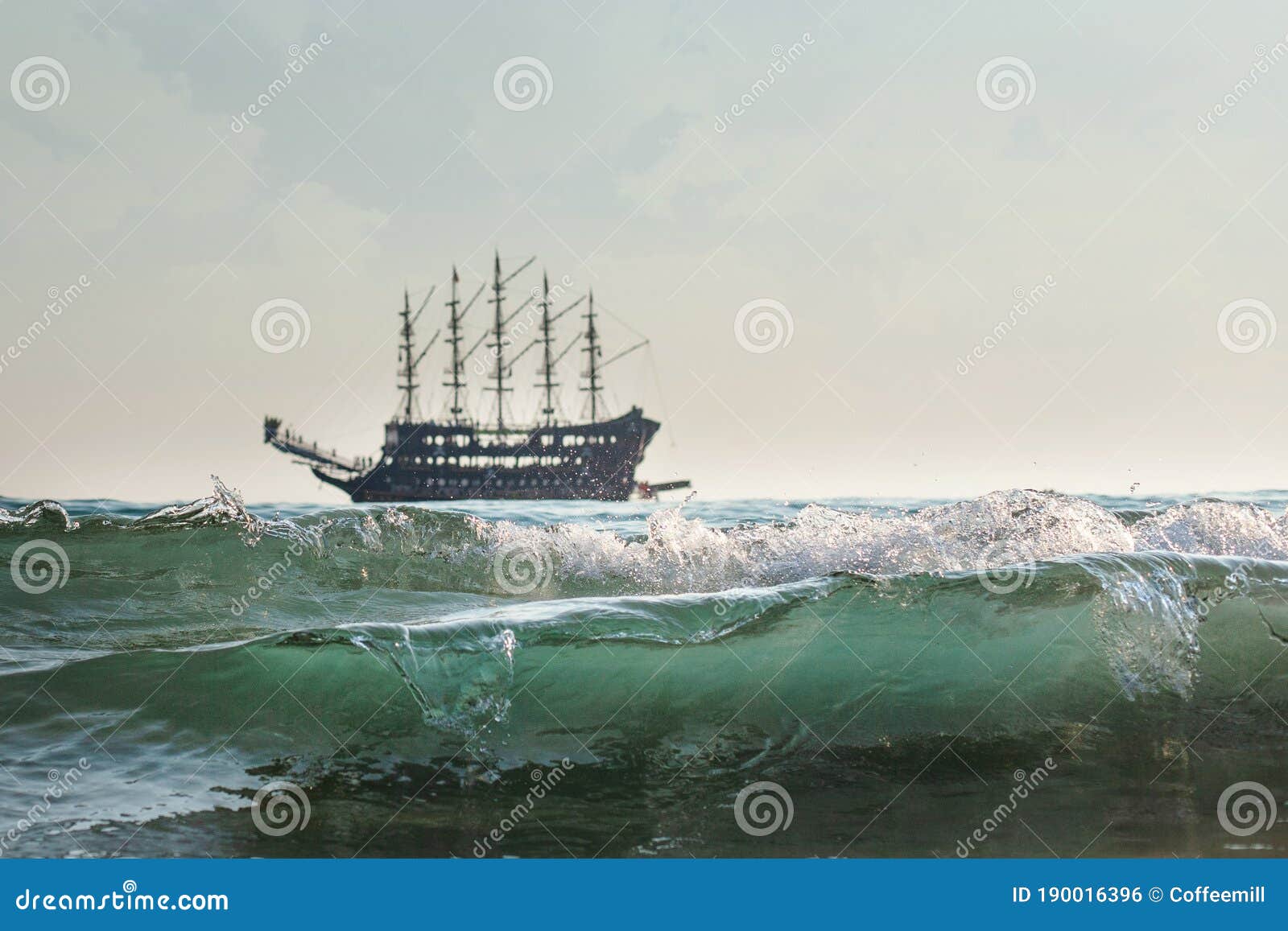 Pirate Ship on the Horizon, Strong Waves are Ashore Stock Photo - Image ...