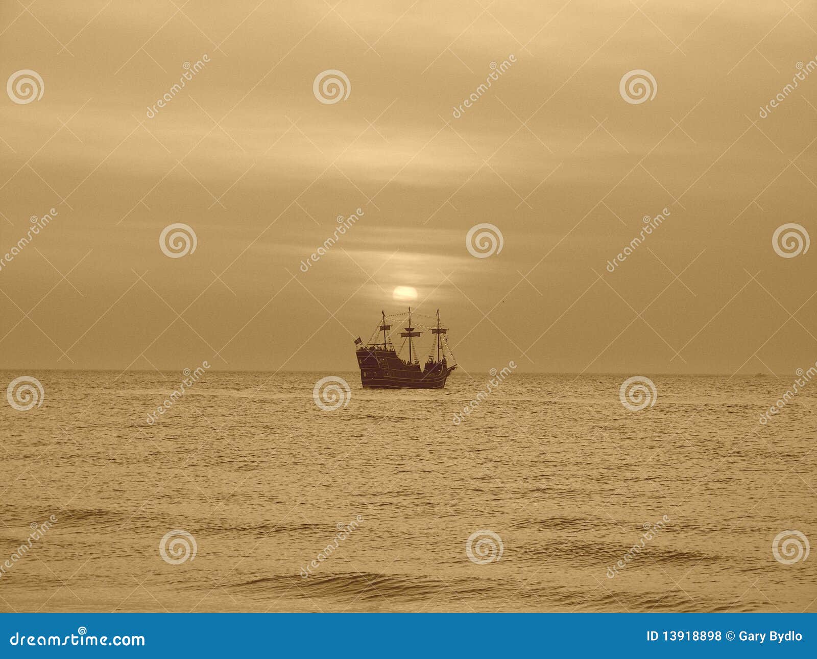 Pirate Ship at Sunset stock photo. Image of sepia, sunsets - 13918898