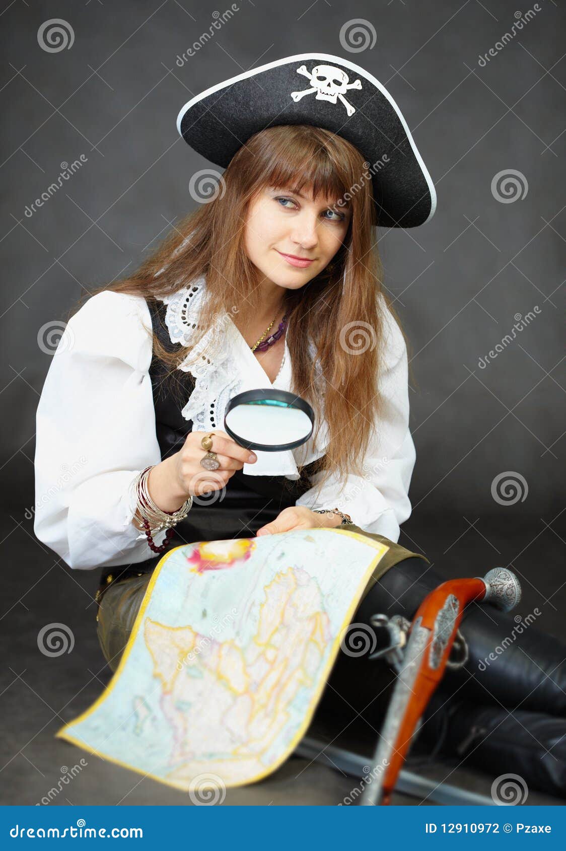 Pirate Sitting with a Map and Magnifying Glass Stock Photo - Image of ...