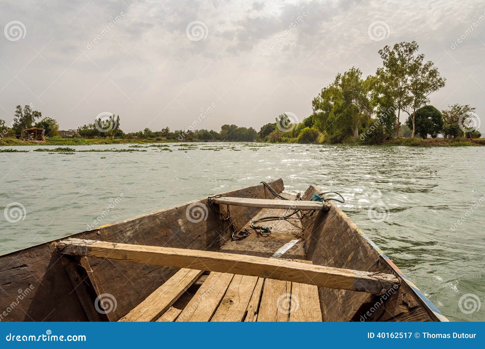 Pirogue on the Niger River stock image. Image of overcast - 40162517