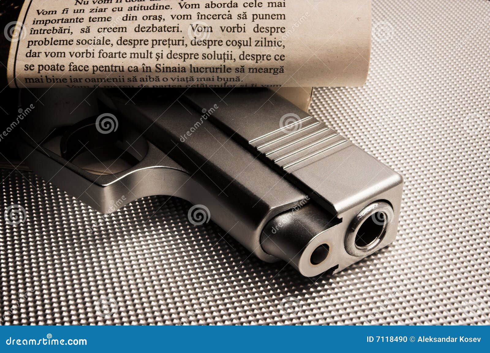 Pistol in newspaper stock photo. Image of liquidator, object - 7118490