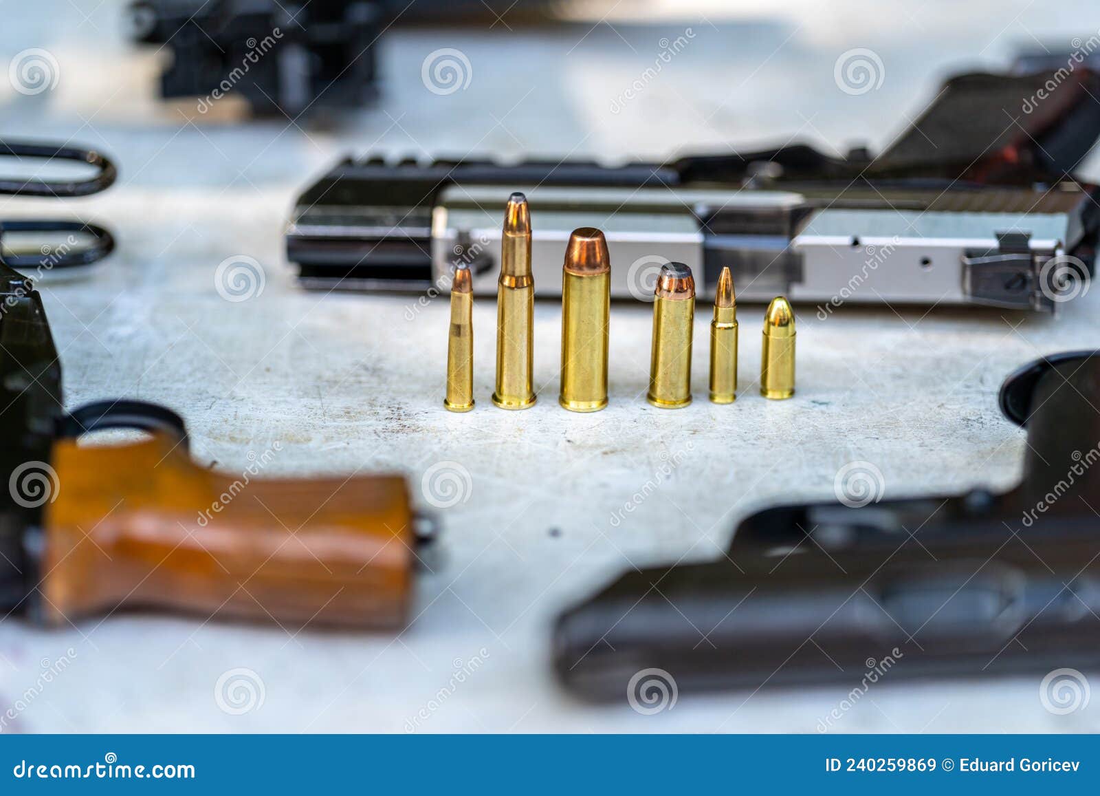 Pistols and Bullets on the Table Stock Image - Image of pistol, rifle ...