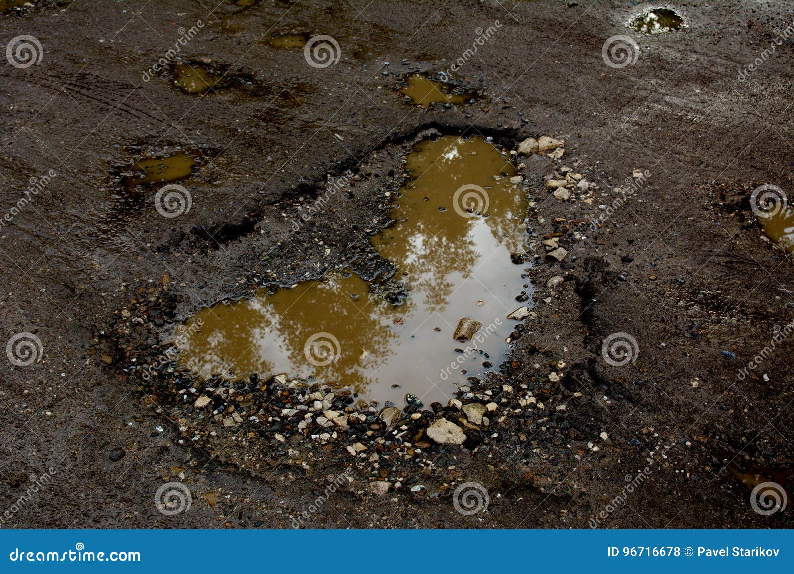 Pit on asphalt pavement stock photo. Image of pavement - 96716678