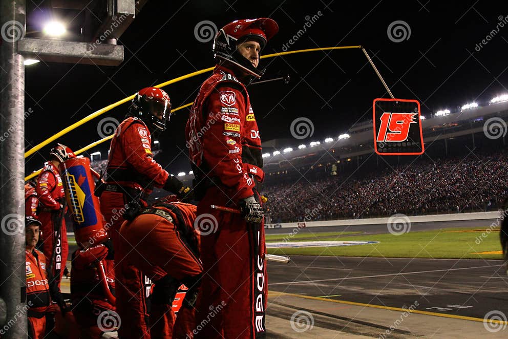 Pit Crew on the Wall editorial image. Image of garage - 4500530