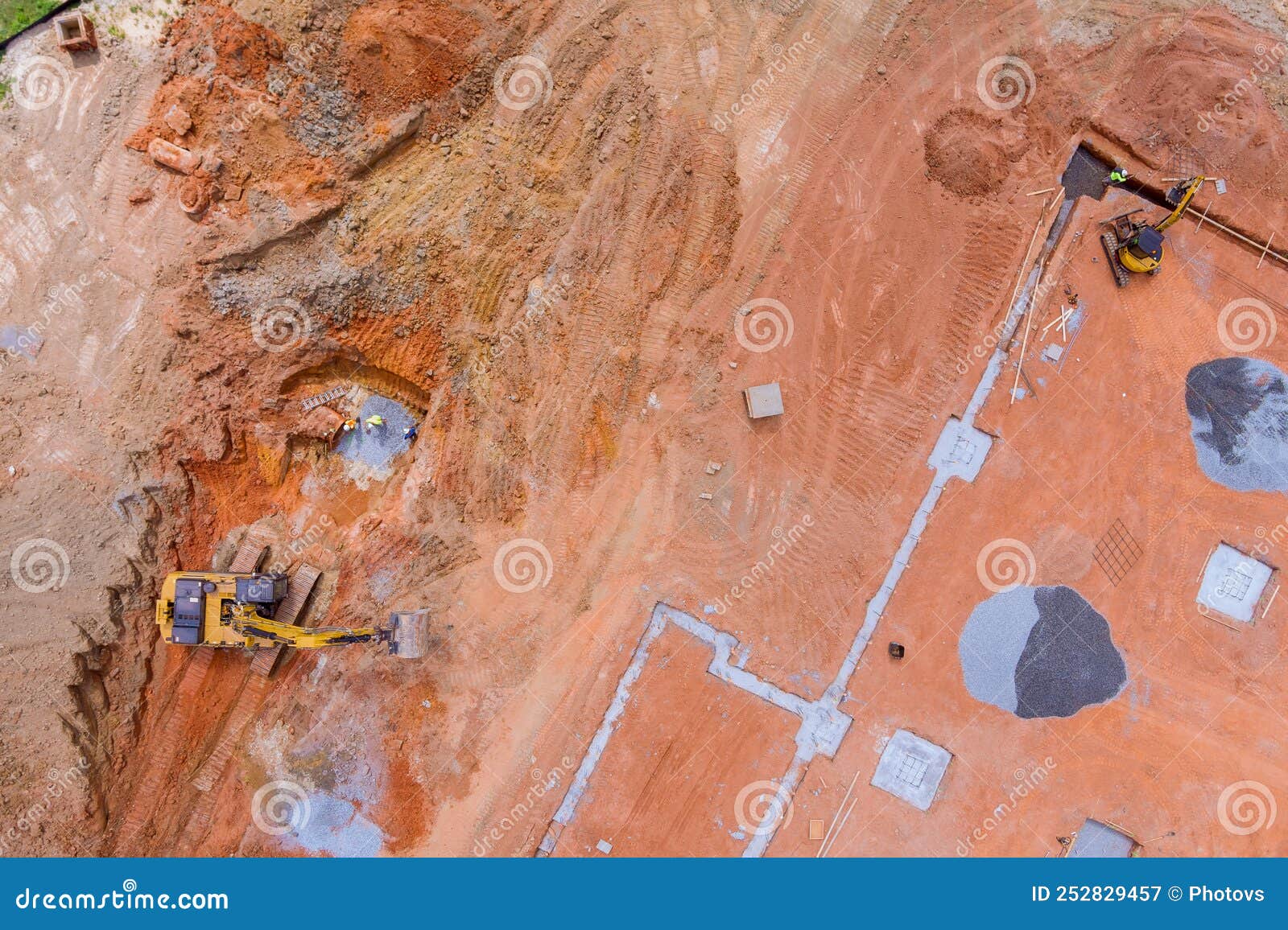A Pit is Dug by the Excavator when Installing Underground Storm Sewer ...