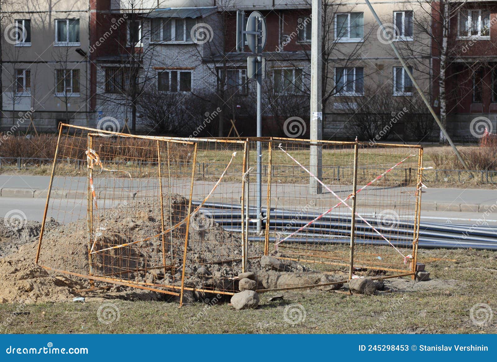 Pit Fenced with Metal Mesh Barriers for Laying Underground Utilities ...