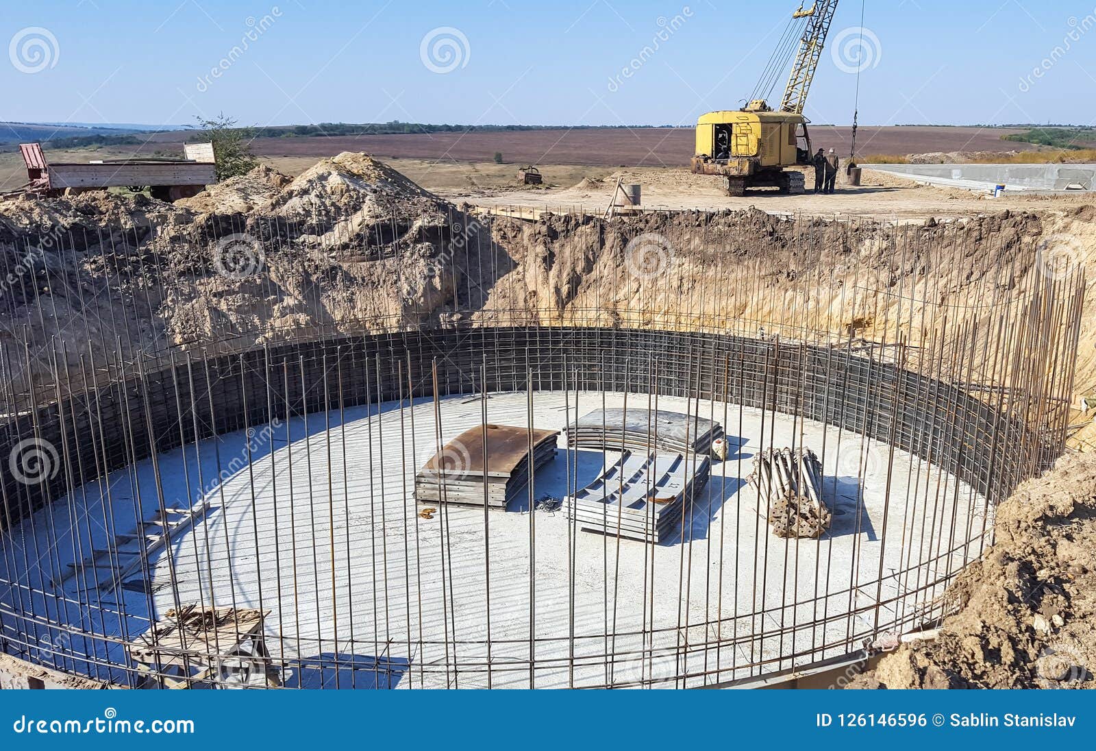 The Pit in the Ground with a Round Foundation with Reinforcement at the ...
