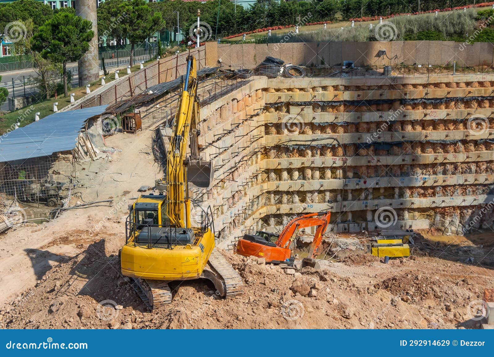 Pit of a Metro Station with Piles in the Ground, Working Excavators Dig ...