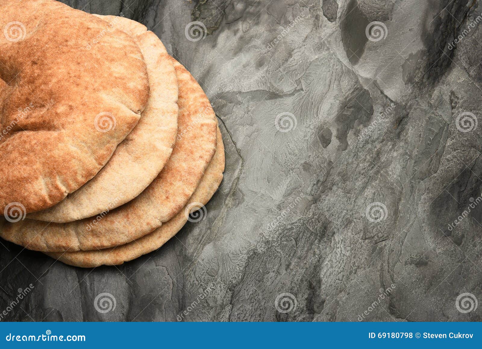 Pita Loaves on Slate stock photo. Image of stone, bakery - 69180798