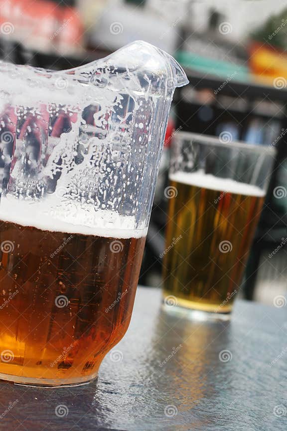 Pitcher of beer stock photo. Image of consume, lager, happy - 2489824
