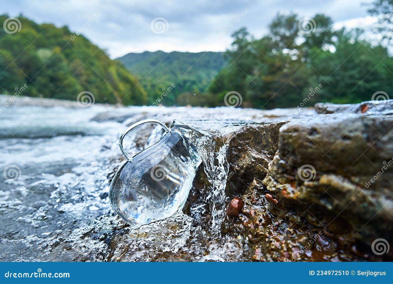 Pitcher of Clean River Water Stock Photo - Image of bulb, bottle: 234972510