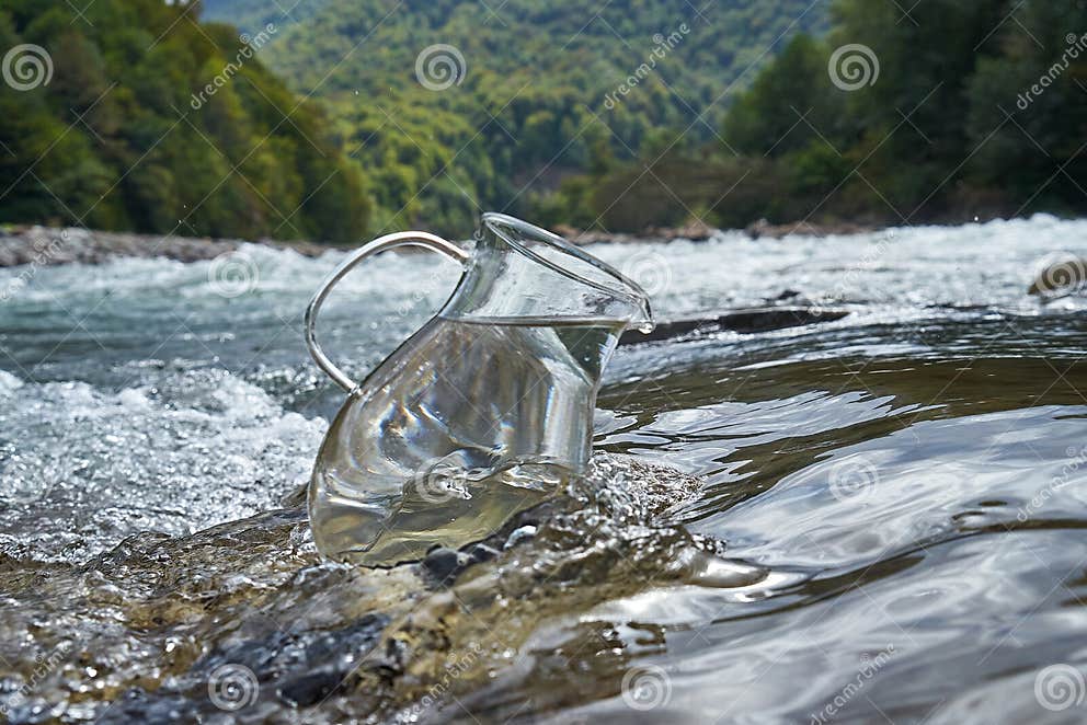 Pitcher of Clean River Water Stock Photo - Image of picnic, mineral ...